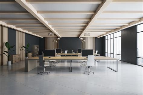 창문과 도시 전망이 있는 고급 로프트 콘크리트 및 목재 공동 작업 인테리어 다양한 가구 장비 및 품목 상업용 작업 공간 개념 3d 렌더링 프리미엄 사진