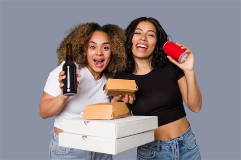 Premium Photo Two Young Women One Latina And One With Afro Hair Laugh