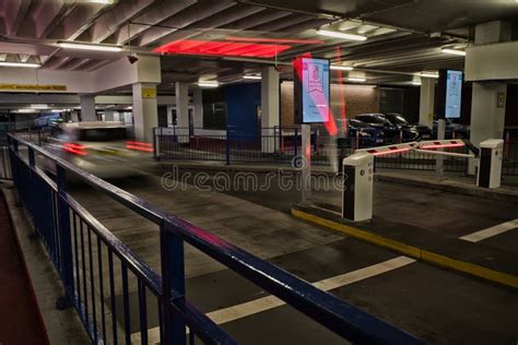 Car Going Through Exit Barrier At Shopping Centre Car Park Woking