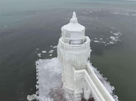 Stunning Footage Captures Frozen Lighthouse On Lake Michigan As Polar