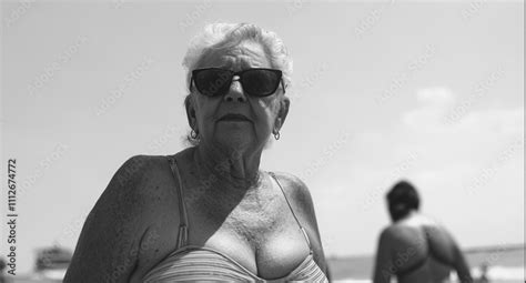 Grandma In A Bikini In The Sun Reflecting Confidence Maturity And