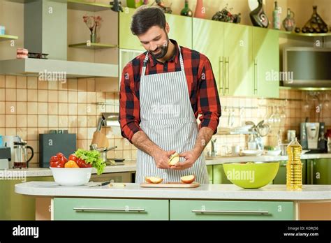 Man Cutting Apple Stock Photo Alamy