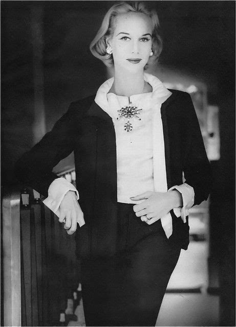 Patsy Pulitzer In Classic After Five Suit Of Black Wool And White Satin With Enormous Jewel