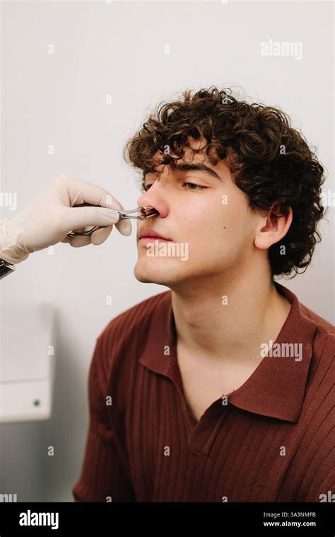 Ent Doctor Checking Nose Of Man Patient With Rhinoscope Rhinoscopy