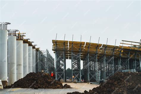 Premium Photo A Largescale Construction Project Of A Highway Bridge With Concrete And Steel
