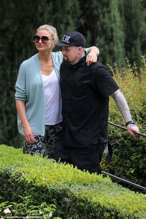 Cameron Diaz Lovingly Snuggles Up To Husband Benji Madden As They Take