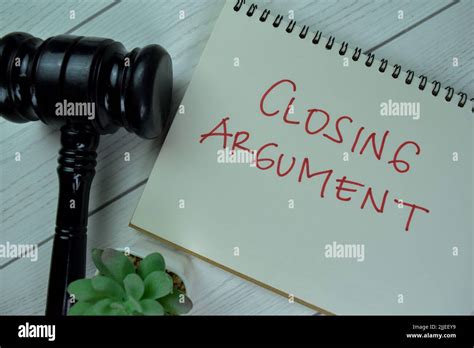 Concept Of Closing Argument Write On A Book With Gavel Isolated On