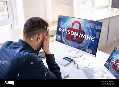 Ransomware Cyber Attack Showing Personal Files Encrypted Screen Stock