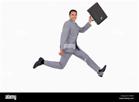 Portrait Of A Businessman Running With A Suitcase Stock Photo Alamy