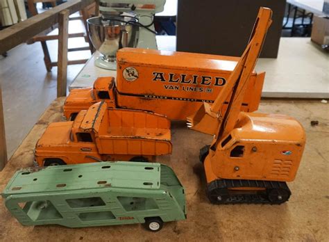 Sold At Auction Four Vintage Metal Toy Trucks Tonka And Others