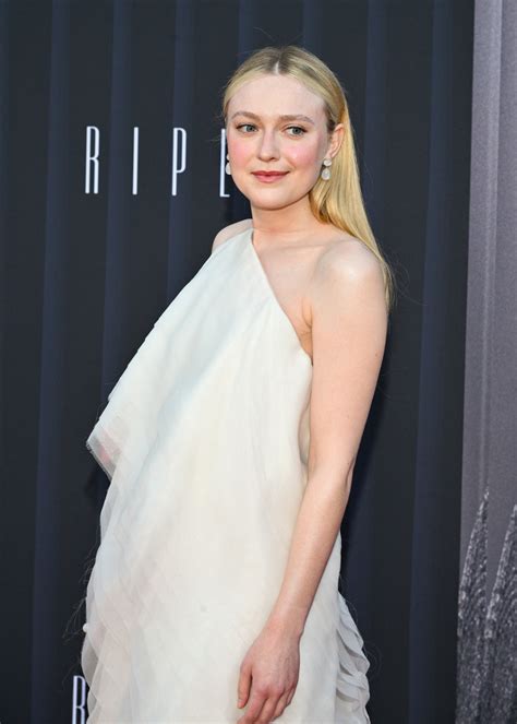 Dakota Fanning Makes An Ethereal Arrival In Asymmetrical Fendi Couture