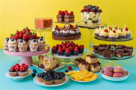 Vibrant Dessert Array With Bright Background Cupcakes Cookies And Treats Premium Ai Generated
