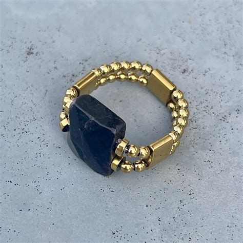 Bague Double Dorée En Rhodonite Noire
