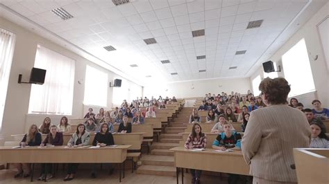 College Professor In Lecture Hall