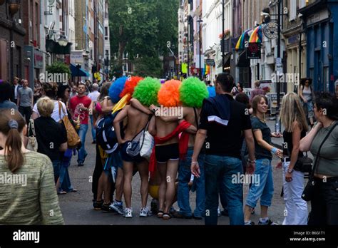 Gay Men In Soho Wearing Wigs During Gay Pride Festival Stock Photo Alamy