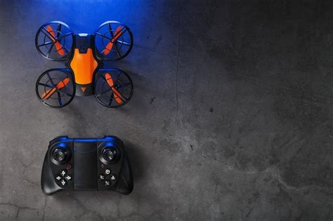 Premium Photo Quadcopter Drone With Joystick Control And Blue Neon Premium Photo Quadcopter Drone With Joystick Control And Blue Neon