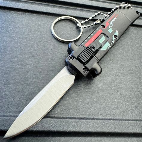 Punisher Mini Stiletto Otf Knife Keychains Megaknife