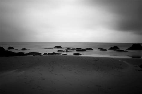 Premium Photo An Black And White Long Exposure Of A Stretch Of Beach