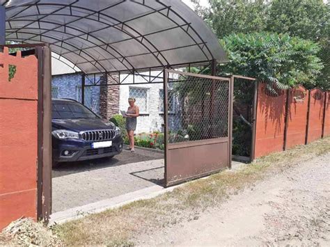Проемы гаражей, въезды после установки ворот сервисным центром