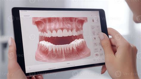 A Dental Professional Examines A Detailed 3d Model Of Teeth And Gums On
