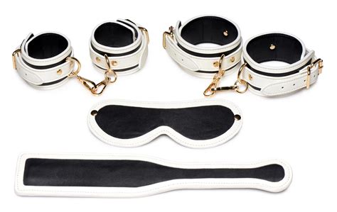 Kink In The Dark Glowing Cuffs Blindfold And Paddle Bondage Set The