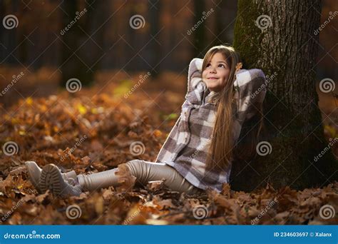 Young Caucasian Girl Candid Autumnal Portrait In The Forest Stock