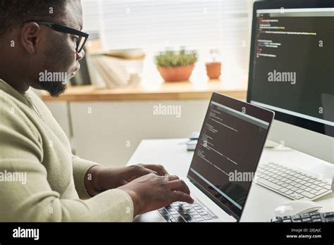 Programmer Typing Data Code While Working On Project In Software