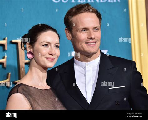 Caitriona Balfe And Sam Heughan Attending The Season Five Premiere Of