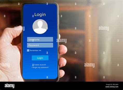 Man Holding Mobile Phone Showing Login Interface On Mobile Phone Screen