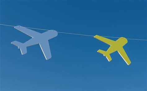 Premium Photo Air Planes Hanging On String In Blue Clear Sky