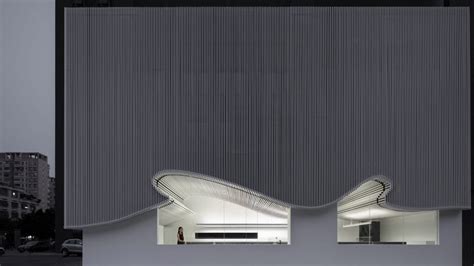 Runxuan Textile Office Features Curvilinear Aluminium Facade