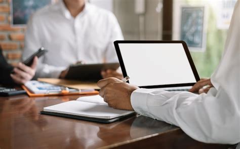 Premium Photo Businessmen Write Project Ideas And Use Laptops To Edit