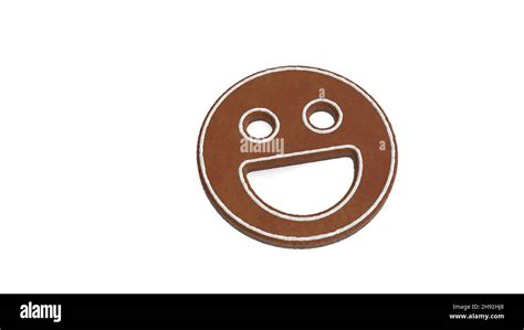 3d Rendering Of Gingerbread Cookie In Shape Of Symbol Of Joyful Emoticon Isolated On White
