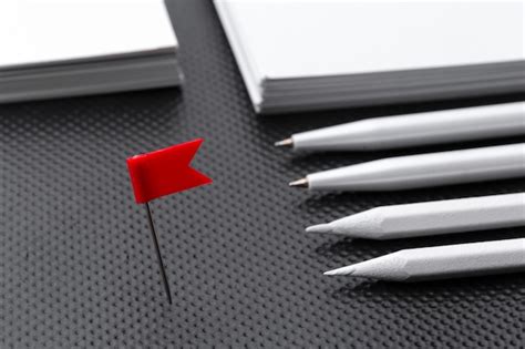 Premium Photo Red Pin And White Pens