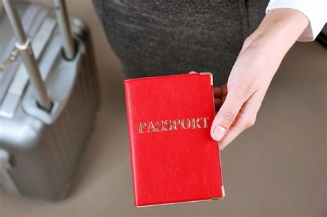 Premium Photo Woman Holding Passport Close Up