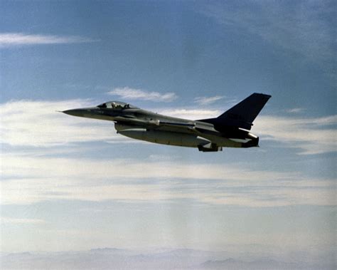 An Air To Air Left Side View Of An F 16a Fighting Falcon Aircraft With