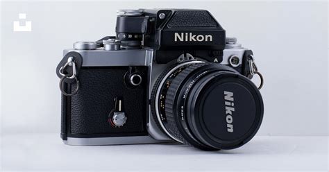 흰색 배경에 검은 색 니콘 카메라 사진 Unsplash의 무료 사진기 이미지