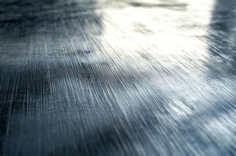 Metallic Brushed Steel Surface With Fine Linear Texture And Soft Light Reflection Stock