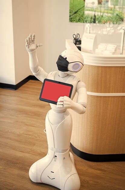 Premium Photo Futuristic Robot Assistant Innovative Technology In Protective Mask Gesturing