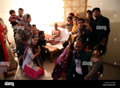 Group Of Faithful In Front Of The Naked Monk Stock Photo Alamy