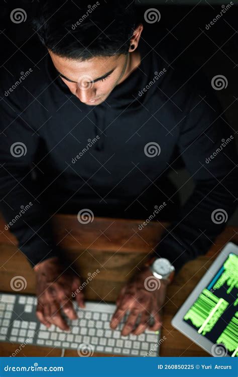 For Programming Hes Your Guy High Angle Shot Of A Young Hacker