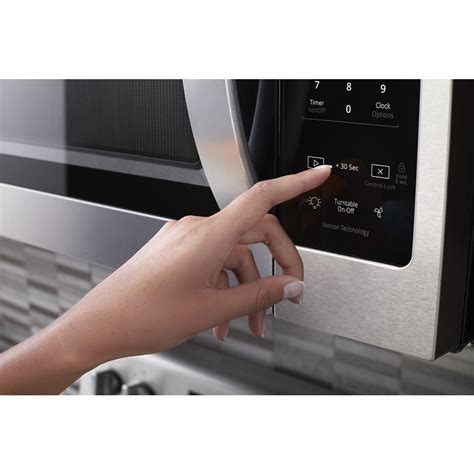 Whirlpool 30 1 7 Cu Ft Over The Range Microwave Oven With 1 000 Watts