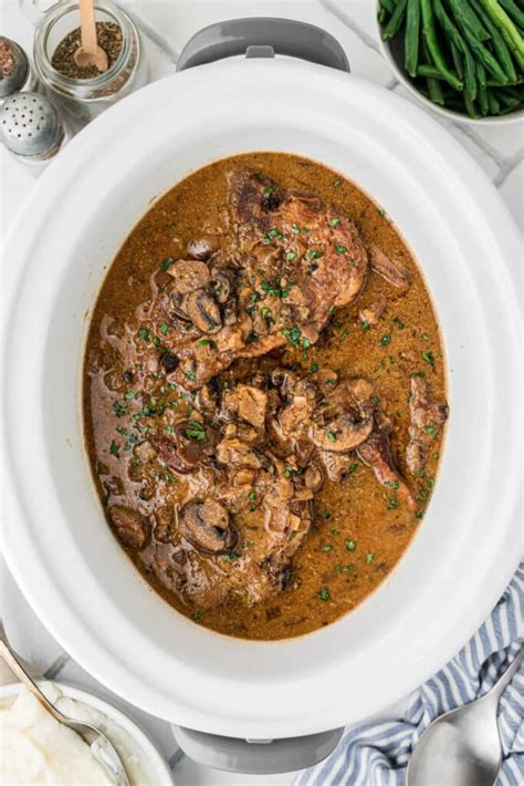 Slow Cooker Smothered Pork Chops Ultra Tender Comfort Food
