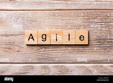 Agile Word Written On Wood Block Agile Text On Wooden Table For Your Desing Concept Stock