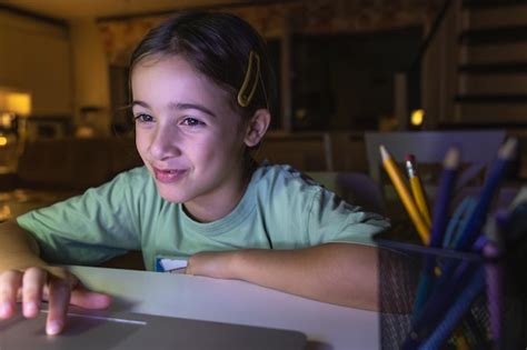 Free Photo Beautiful Girl Studies At The Computer At Night Technology