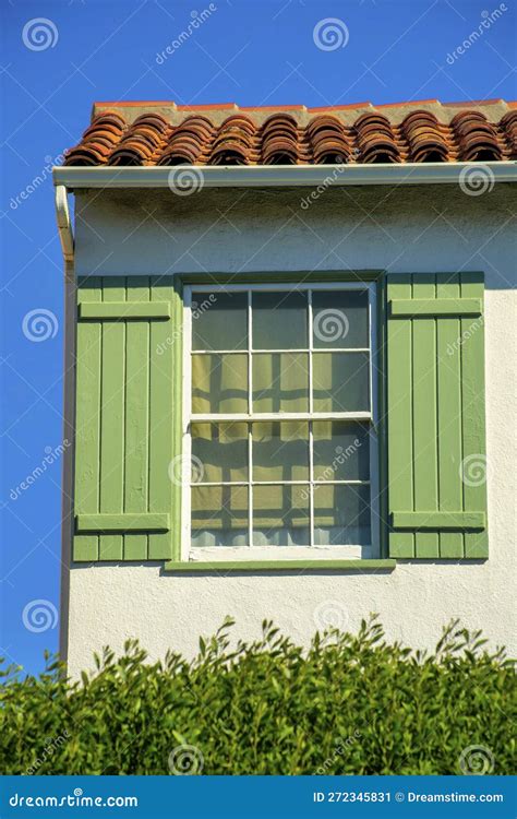 Hidden Or Secret Window With Green Shutters Adobe Red Roof Tiles With