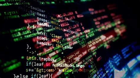 Download A Computer Screen With Colorful Code On It Wallpaper