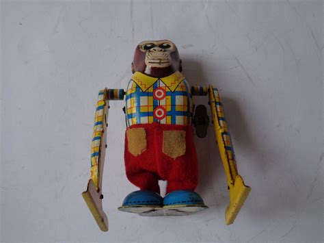 T P S Tumbling Chimp Wind Up Toy Paradise