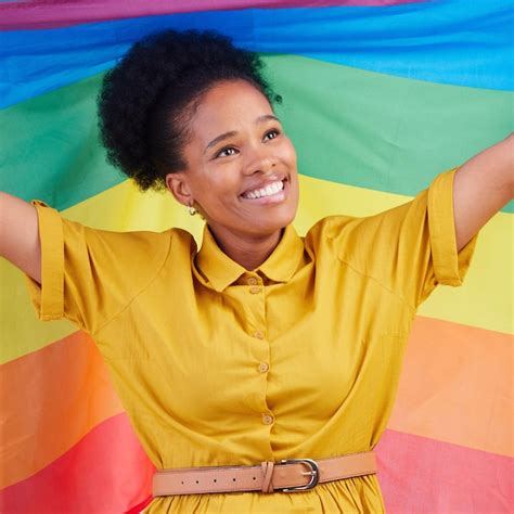 Premium Photo Gay Flag And Happy Black Woman In Studio For Pride