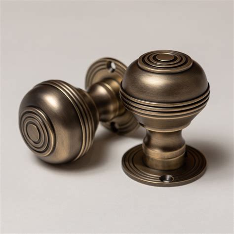 Solid Brass Door Knobs Ringed Antique Brass Pair